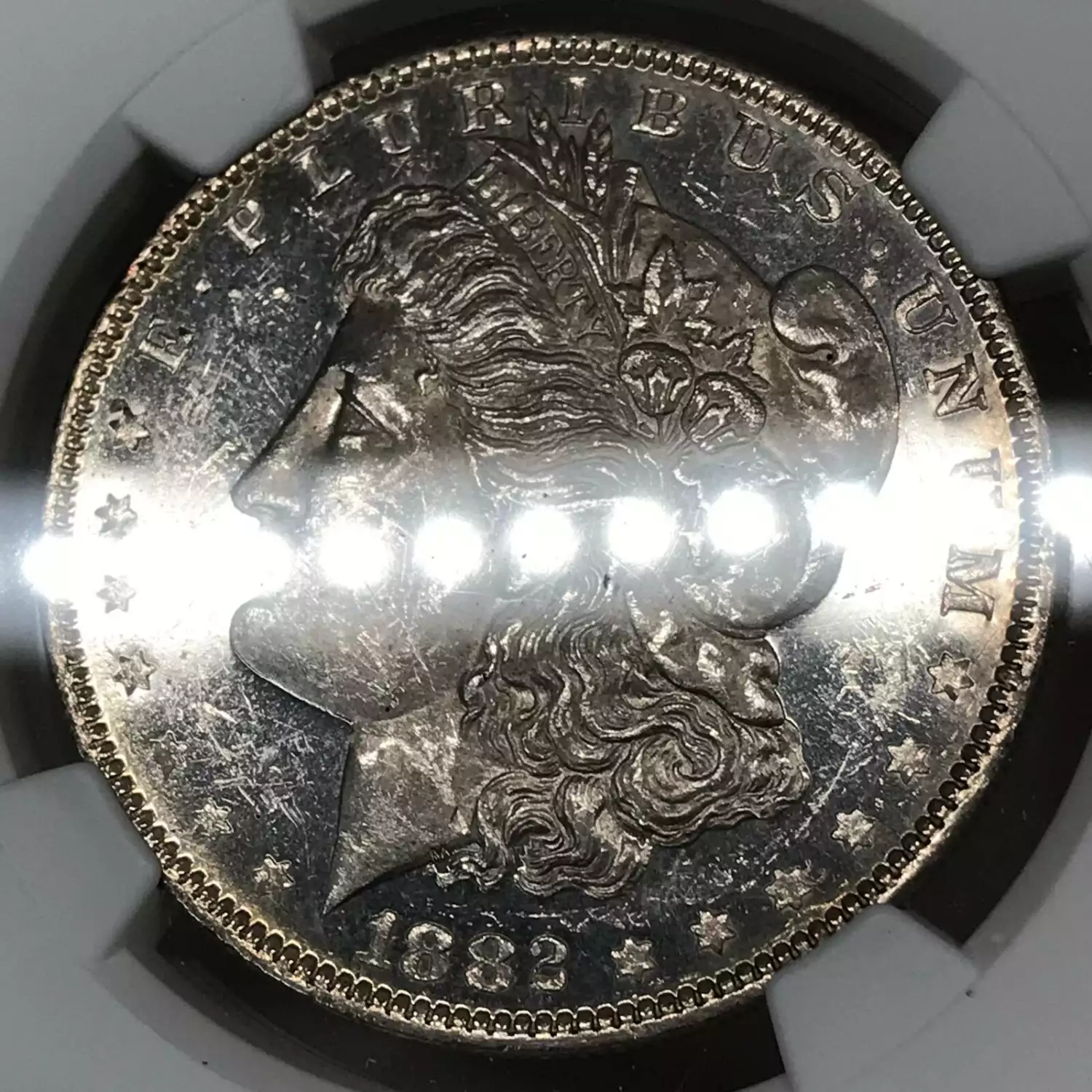 1882-O Morgan Silver Dollar NGC MS-63 PL - Old Pueblo Coin