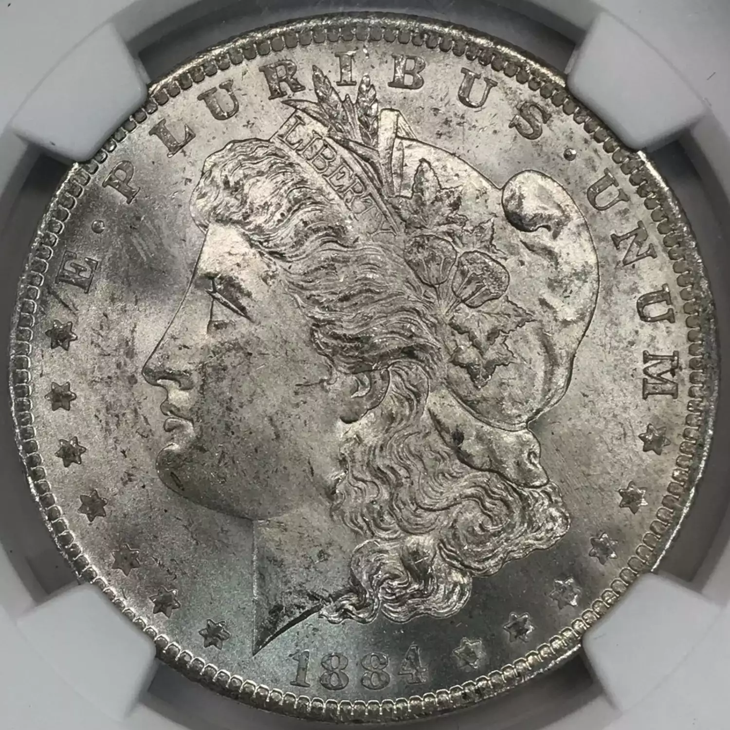 1884-O Morgan Silver Dollar NGC MS-64 - Old Pueblo Coin