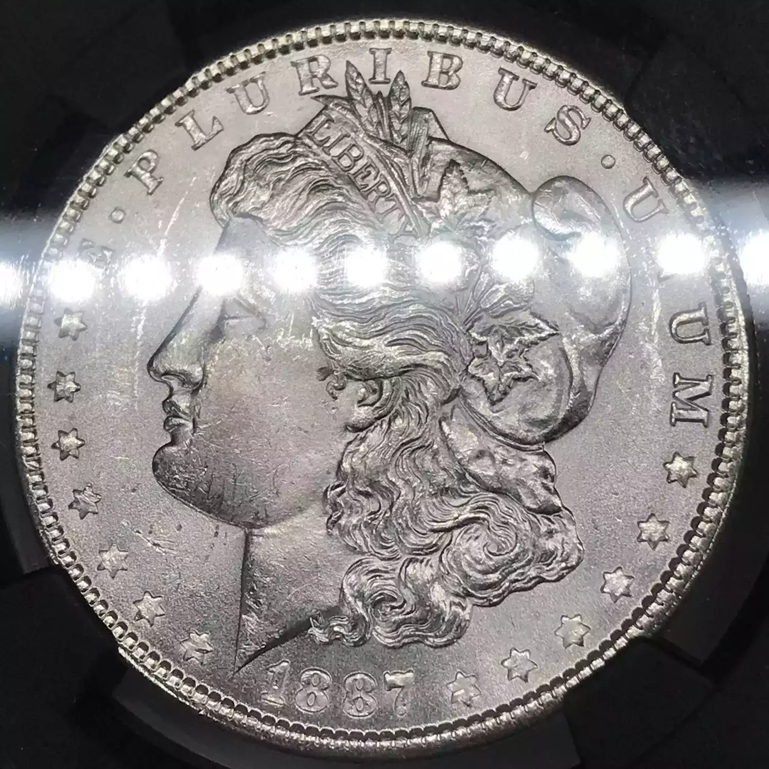 1887 Morgan Silver Dollar NGC MS-63 Original Bag Fragment Series - Old Pueblo Coin