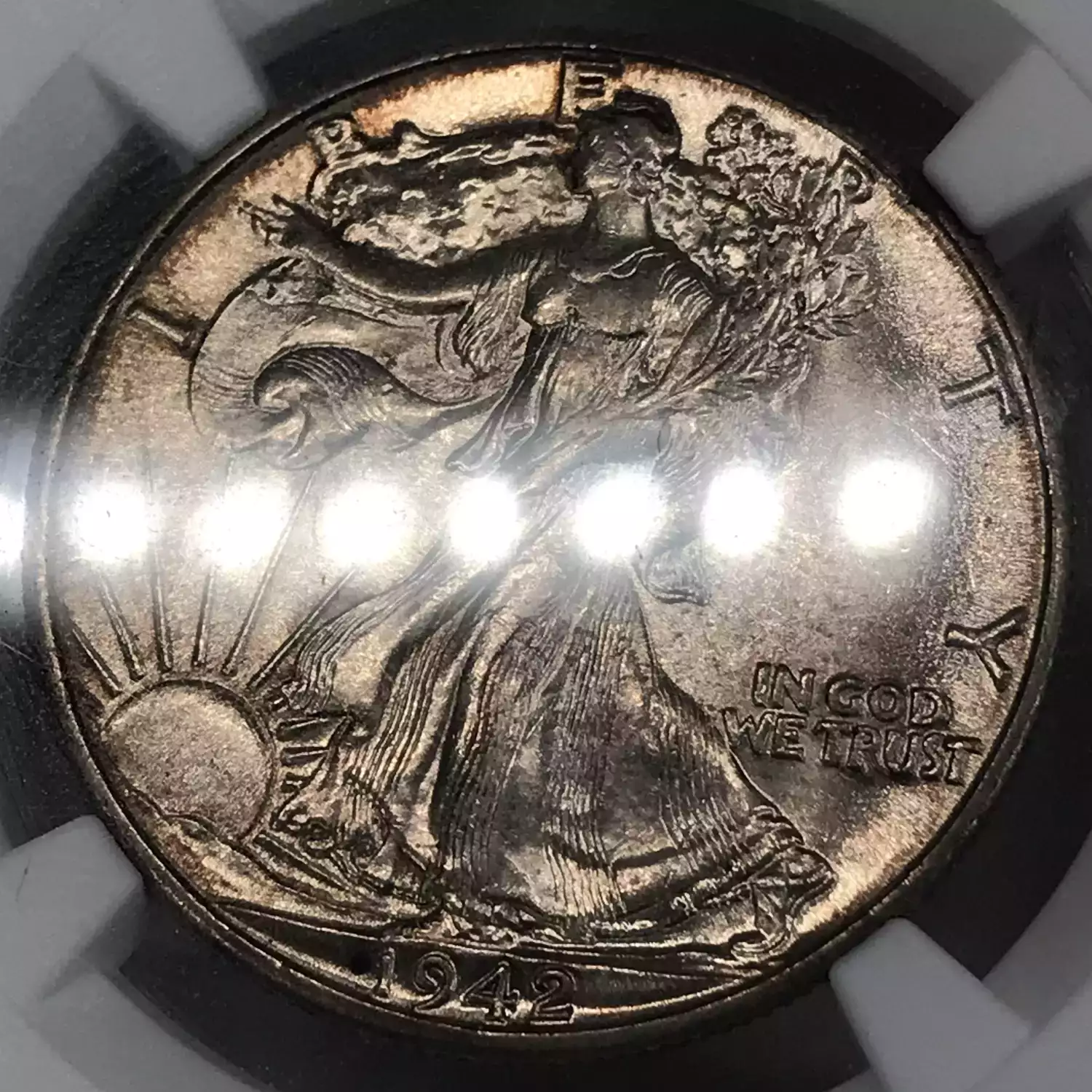 1942 Walking Liberty Half Dollar NGC AU-58 - Old Pueblo Coin